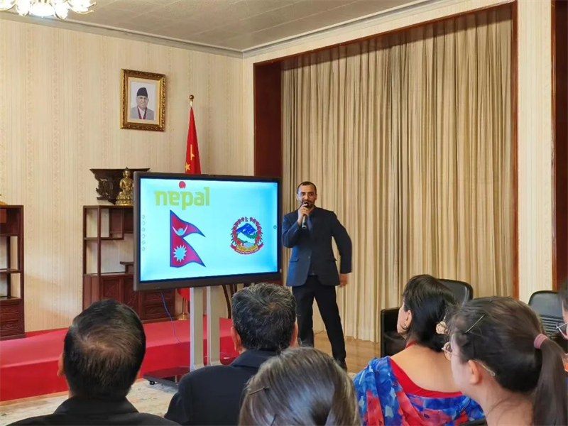 Chinese and foreign teenagers sing Asian Games Song at Nepalese Embassy ...
